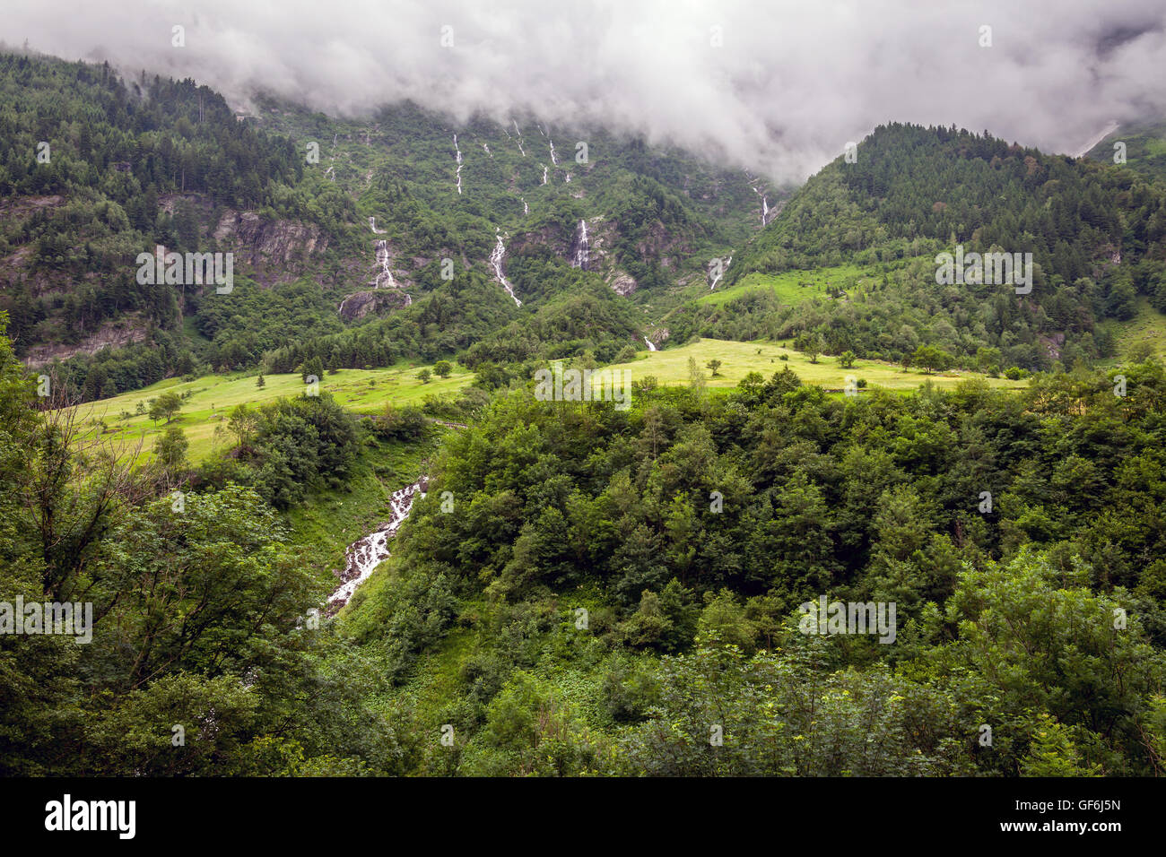 Waterfalls in the Bernese Alps Stock Photo - Alamy