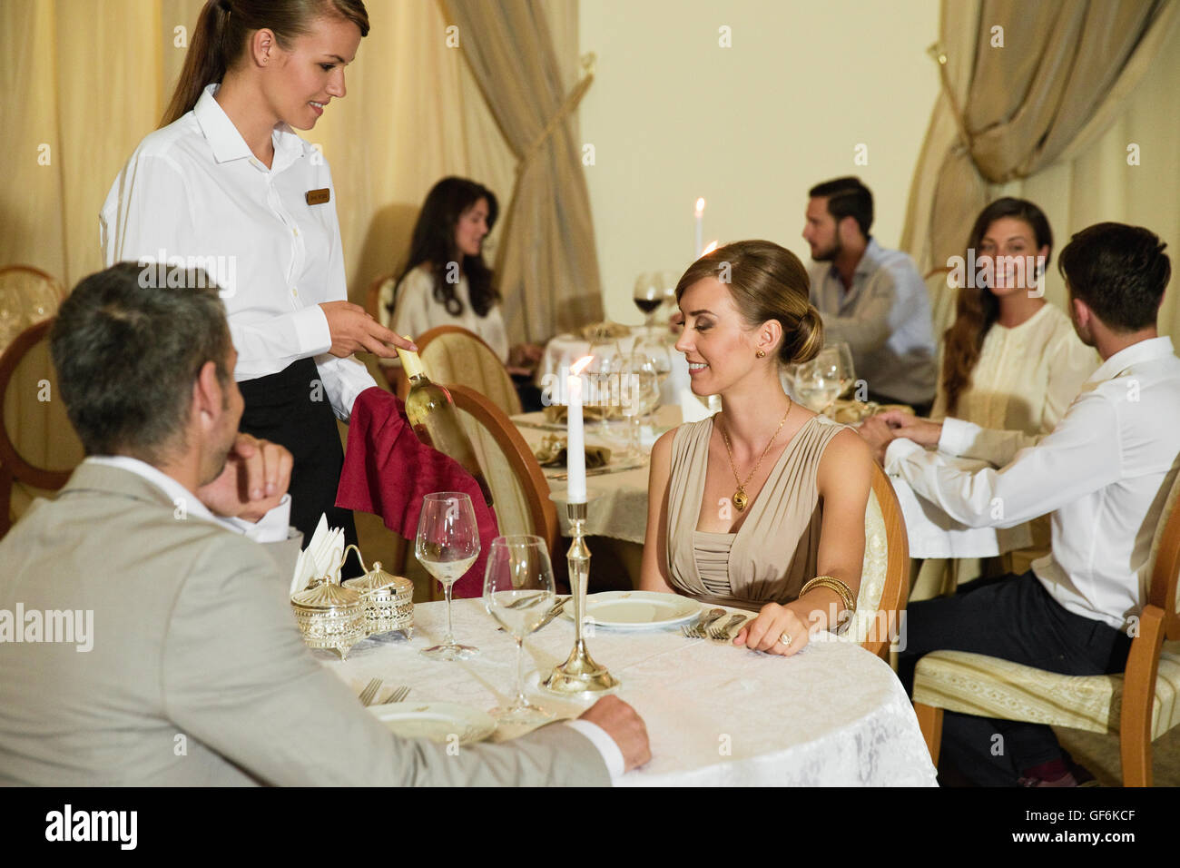 People sitting in restaurant Stock Photo - Alamy