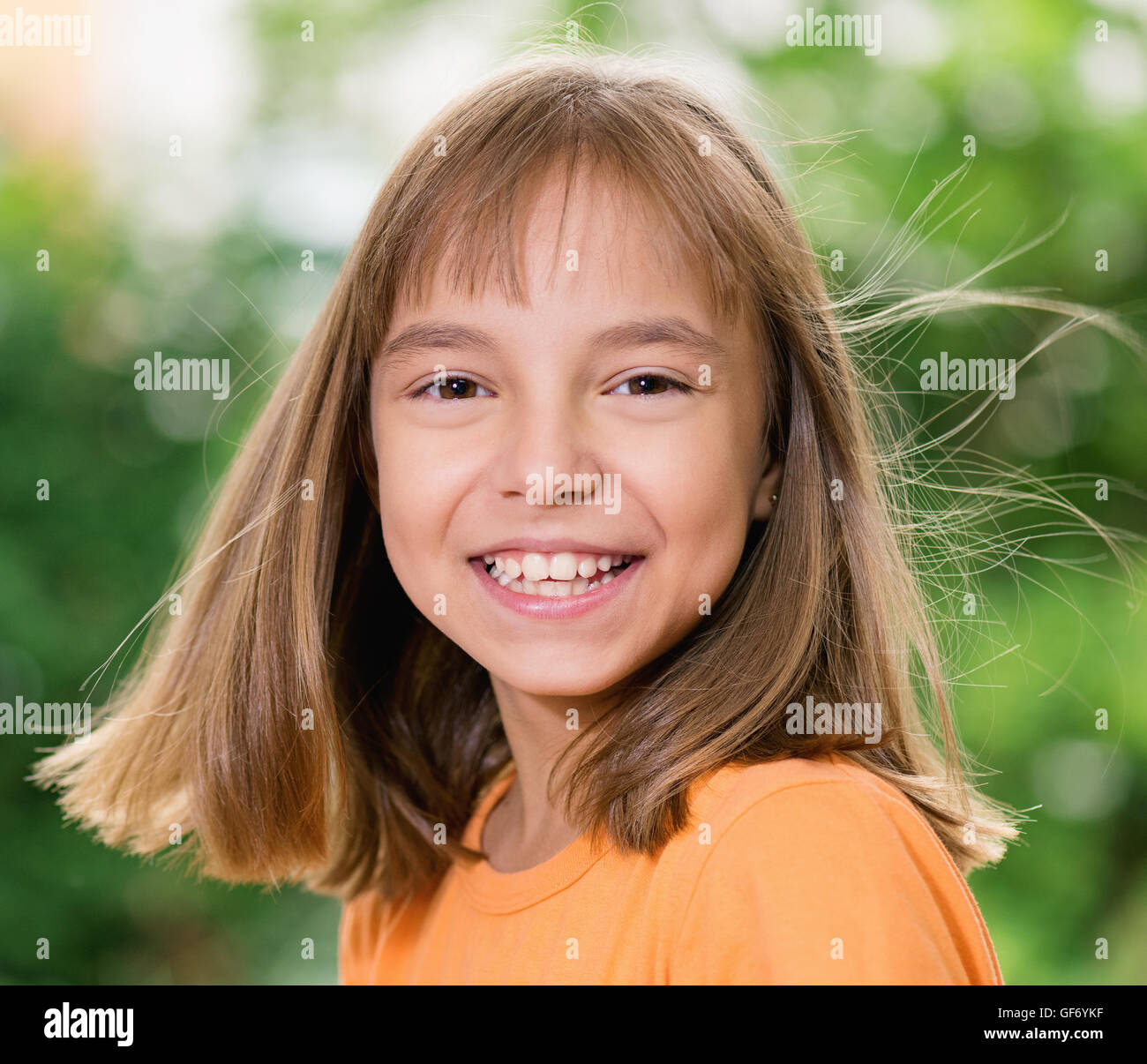 Portrait of smiling girl Stock Photo - Alamy