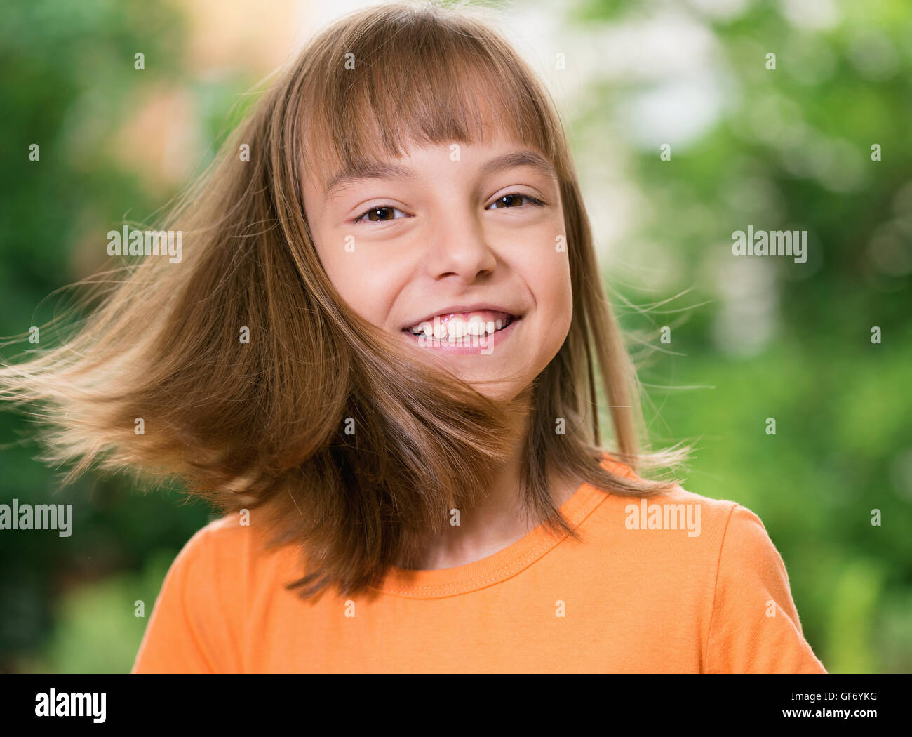 Portrait of smiling girl Stock Photo - Alamy