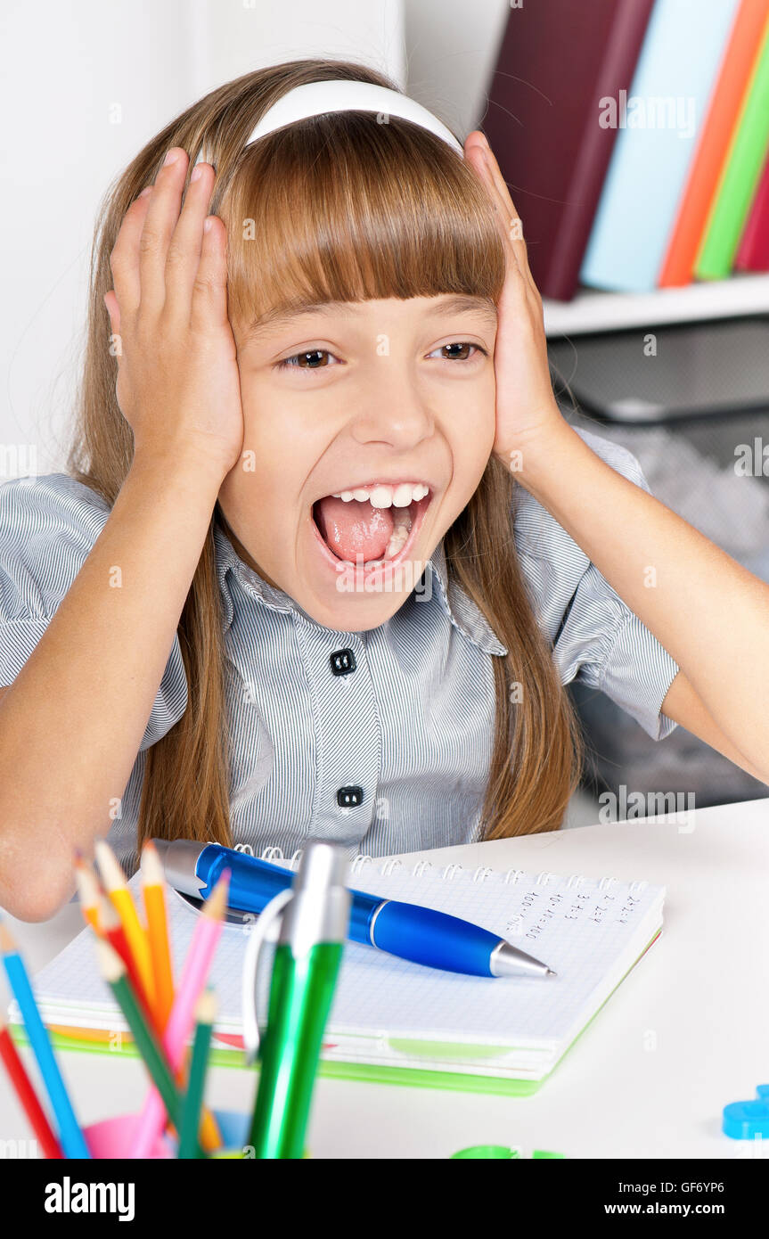 Shocked student girl in school Stock Photo - Alamy