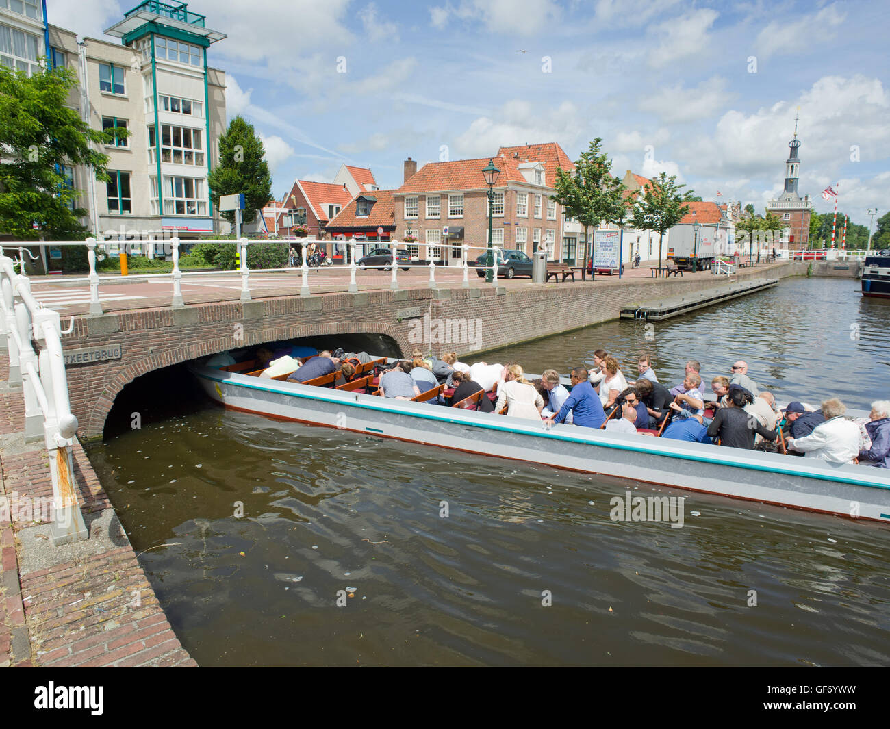 Alkmaar Holland Tour Boat Passengers Prepare to duck under low bridge ...