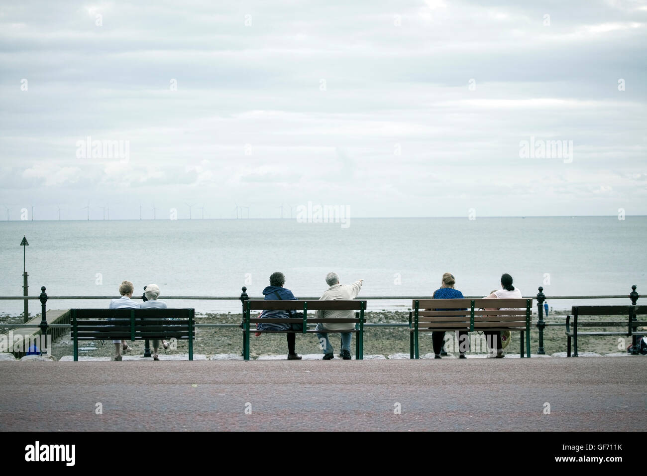 Sitting on benches on llandudno promenade hi-res stock photography and ...