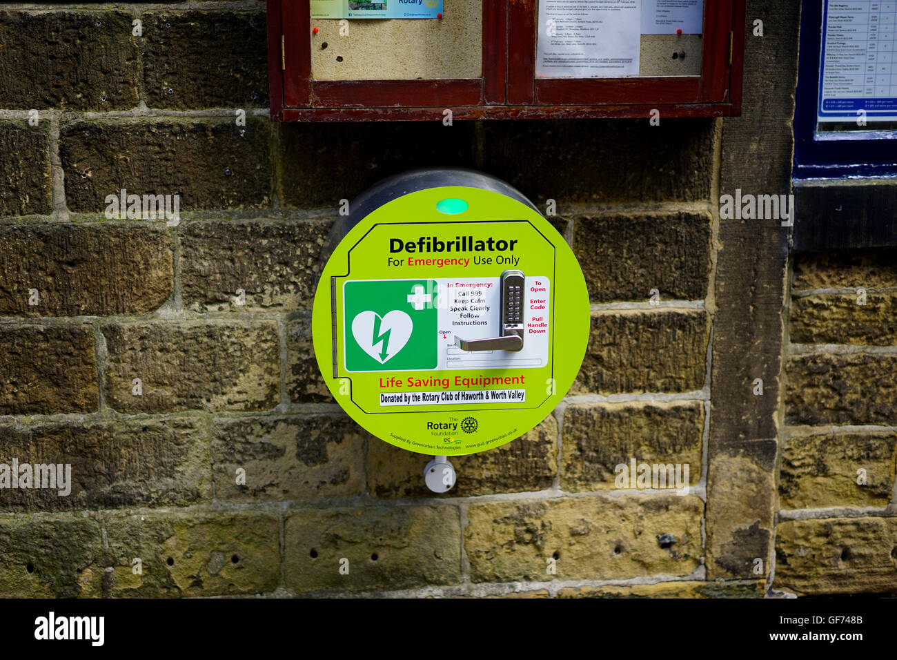 Defibrillator on a wall outside chemist shop in Haworth,Lancashire,UK ...
