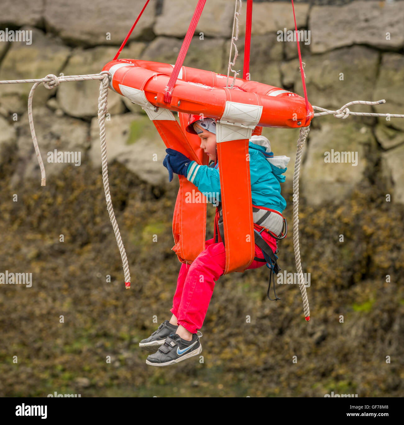 Training exercise- child on a rescue belt with a life preserver at The ...