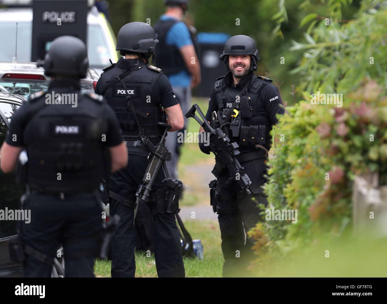Armed police at the scene in Smallfield, Surrey, after reports someone ...