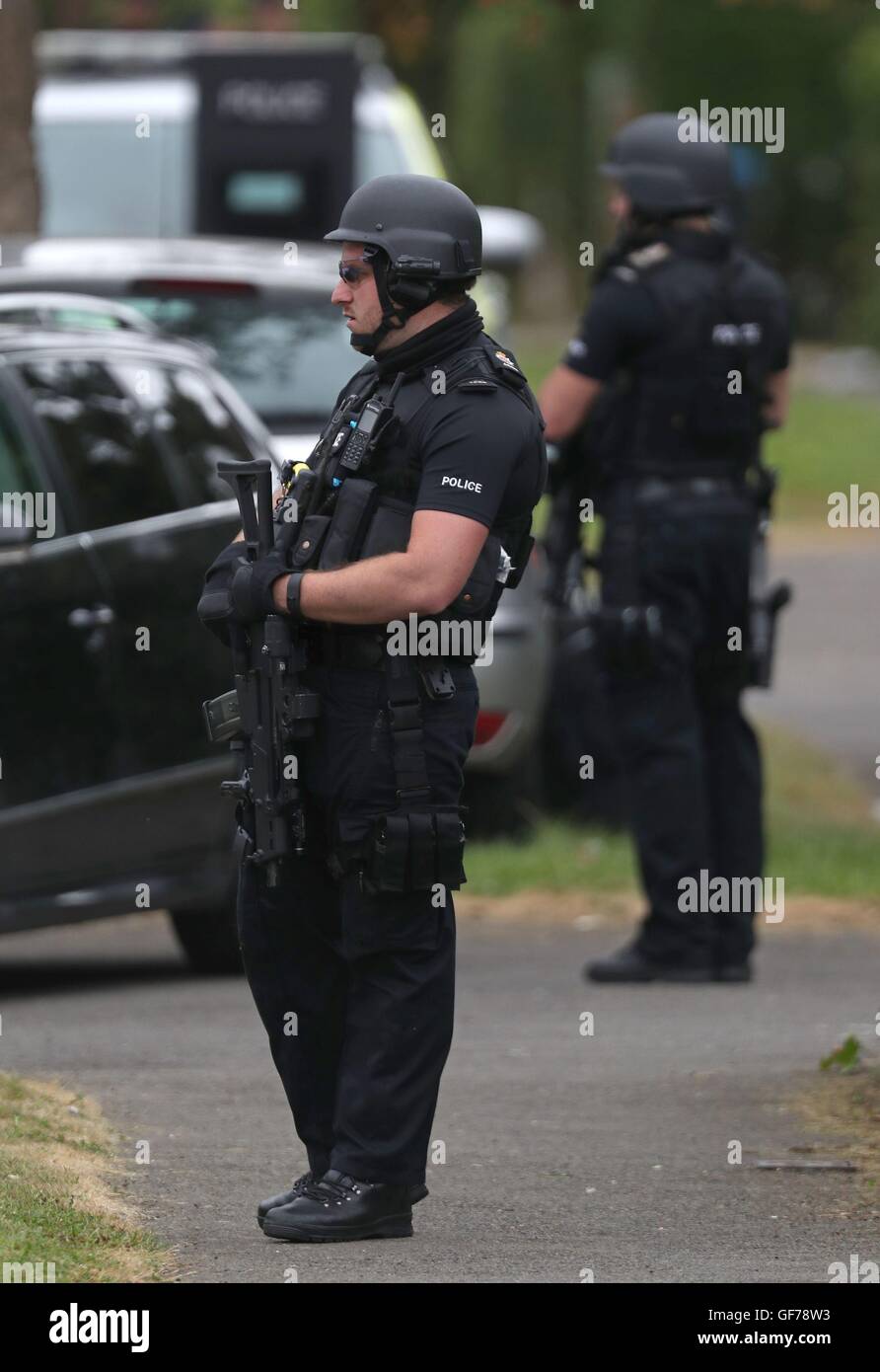 Armed police at the scene in Smallfield, Surrey, after reports someone ...