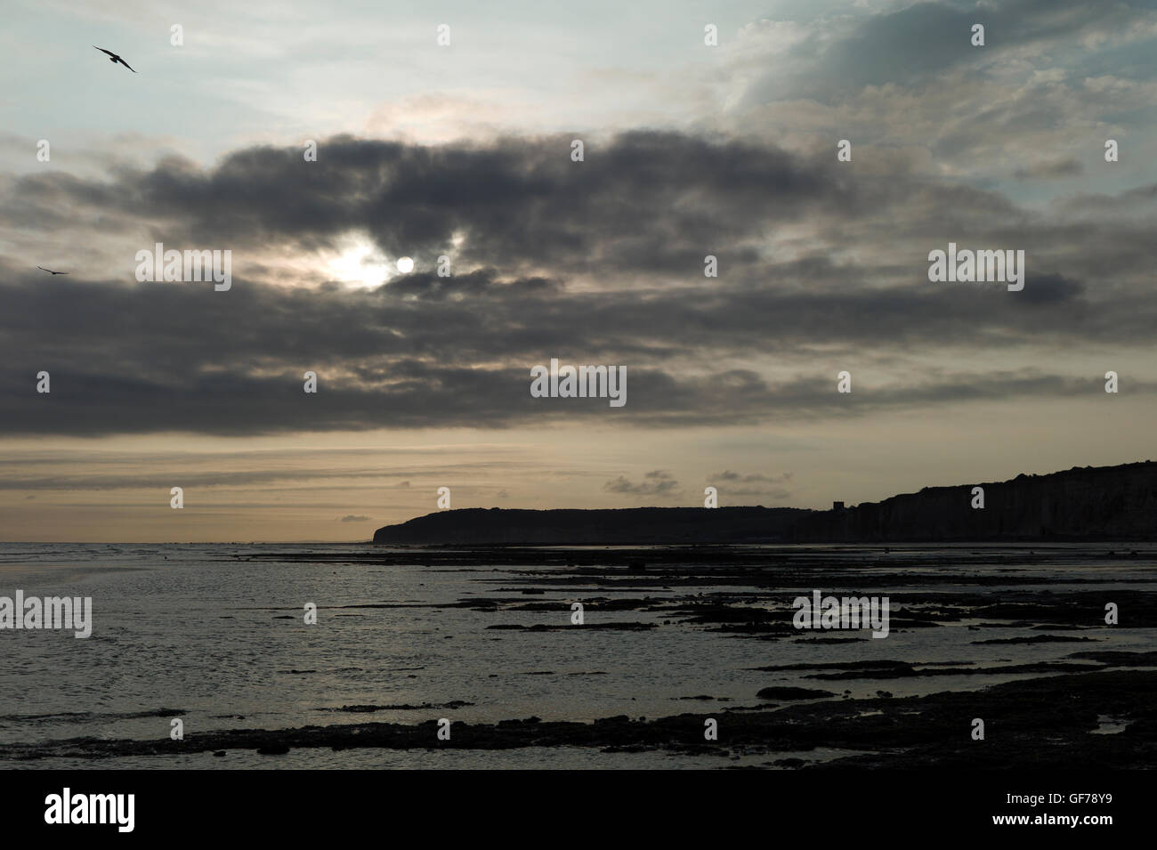 low morning sun through clouds, over cliffs, Normandy,France Stock ...