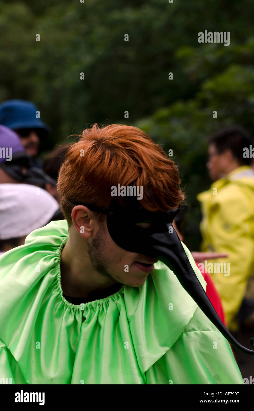 Male dancer with a long-nosed mask taking part in the Carnival Parade ...