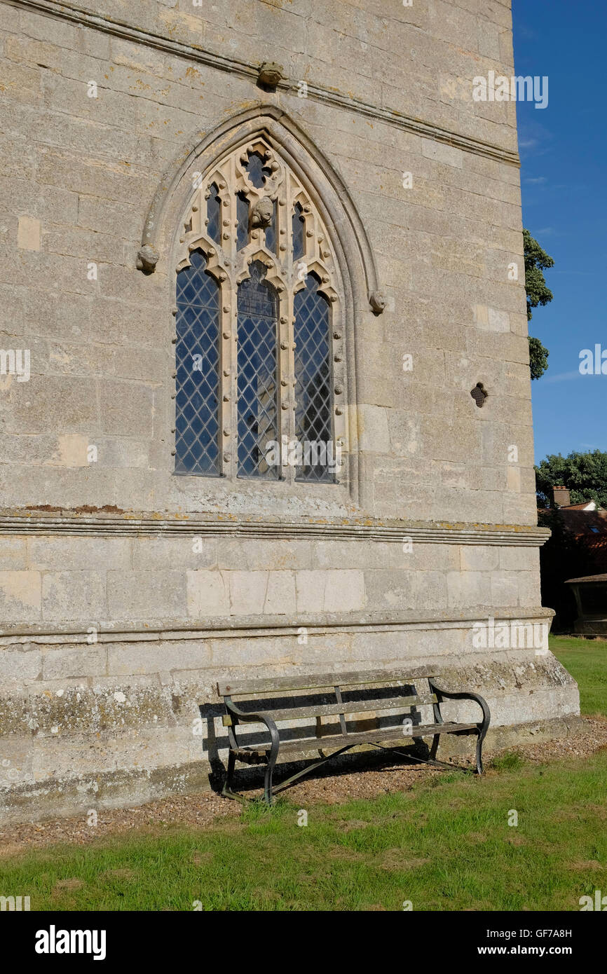 Ornate window and bench at St Nicholas' church, Normanton, Lincolnshire ...