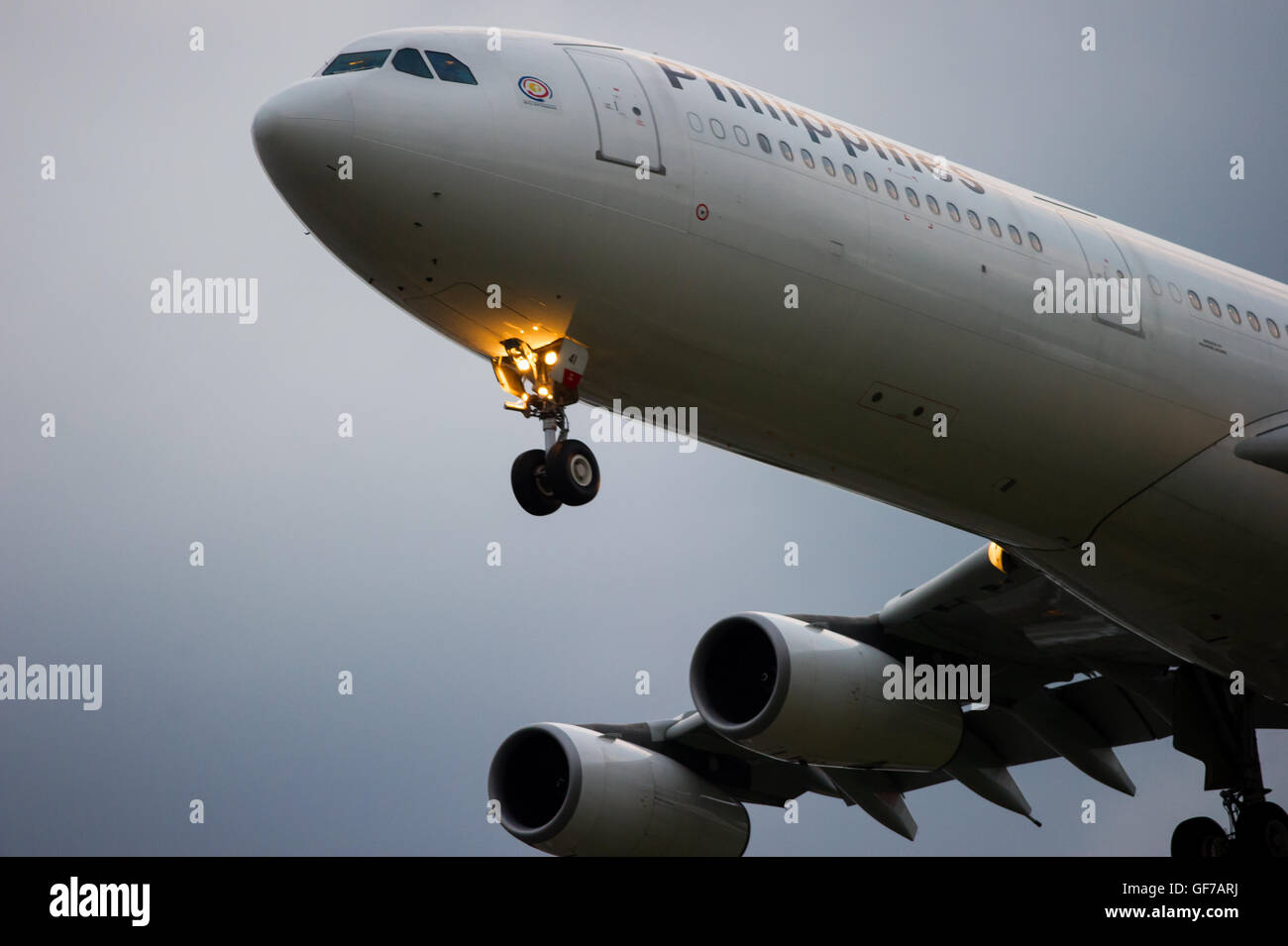 Philippine airlines A340 coming in to land at Heathrow airport Stock ...