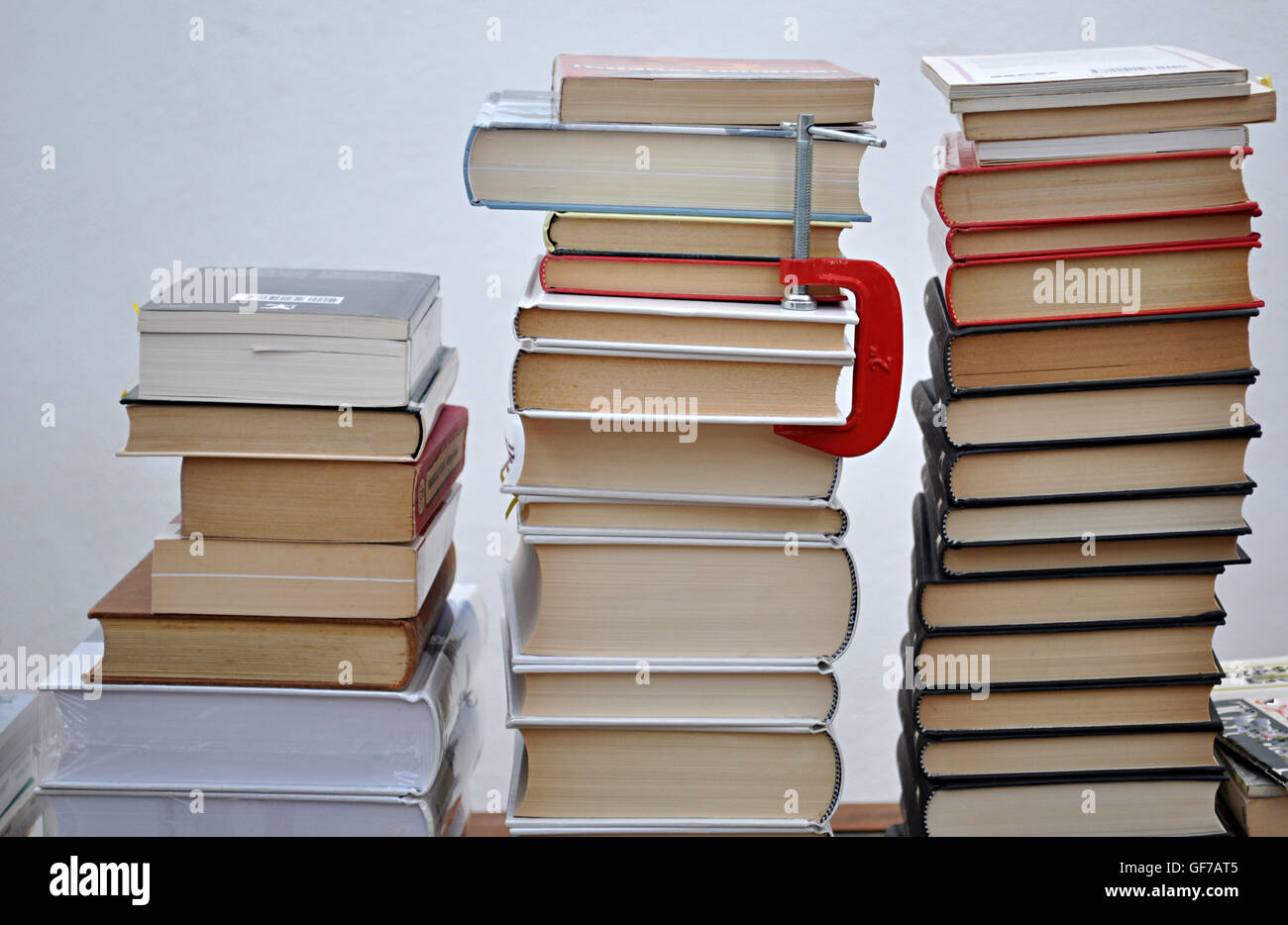 piles of books Stock Photo - Alamy