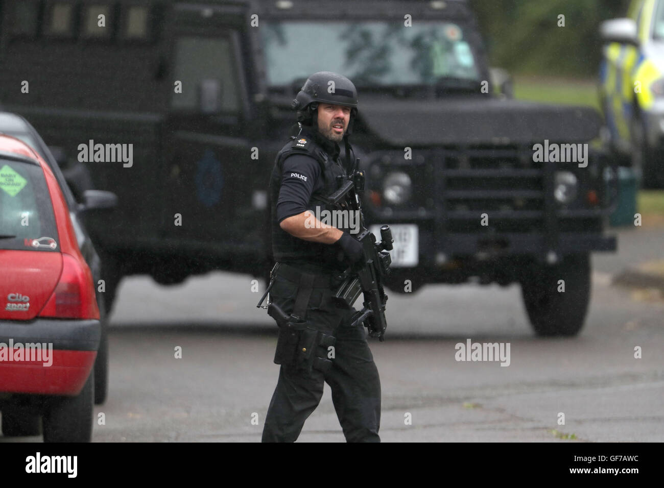 Armed police at the scene in Smallfield, Surrey, after reports someone ...