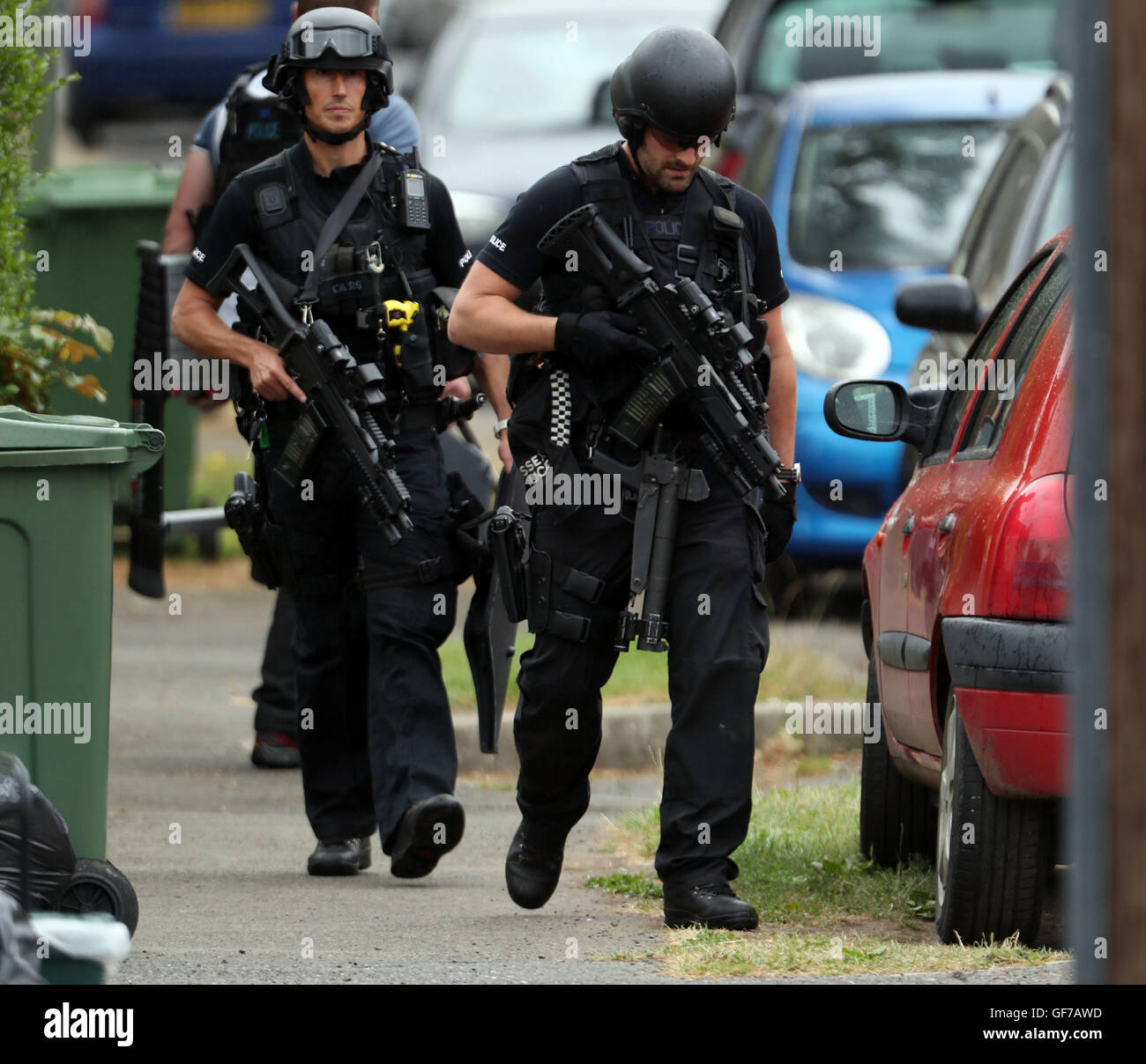 Armed police at the scene in Smallfield, Surrey, after reports someone ...