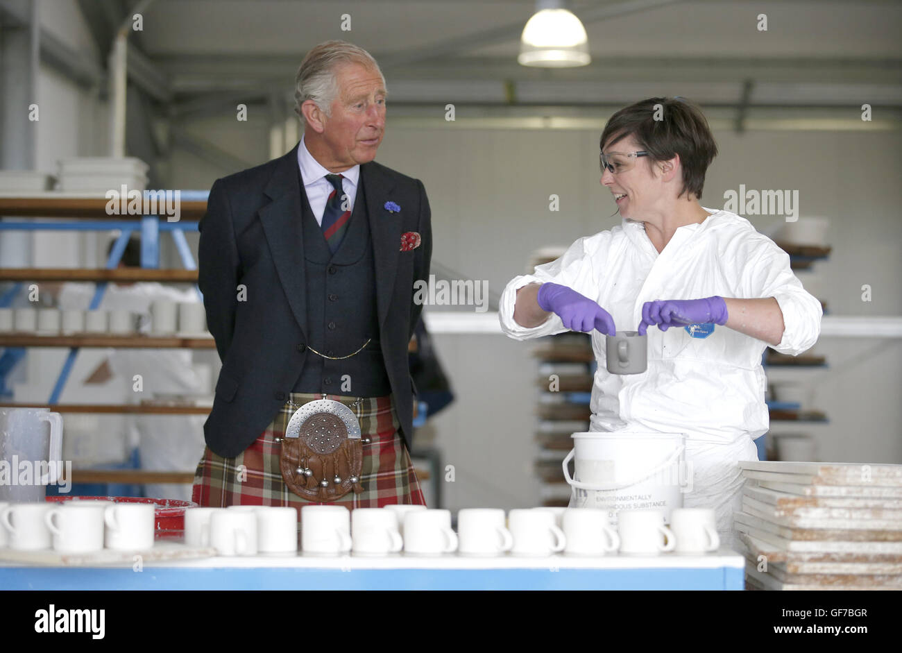 The Prince of Wales, also known as the Duke of Rothesay, is shown how ...