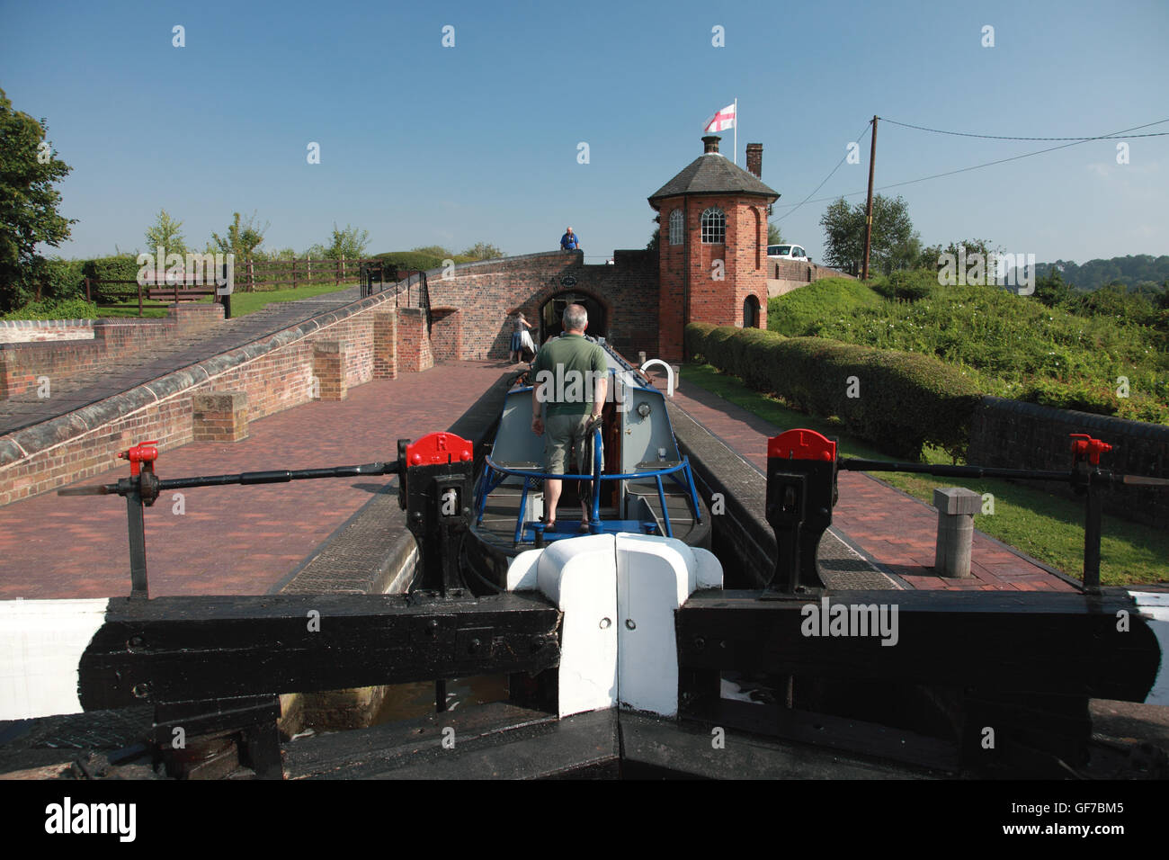 Narrowboat entering the second of the three Bratch Locks, Staffordshire ...