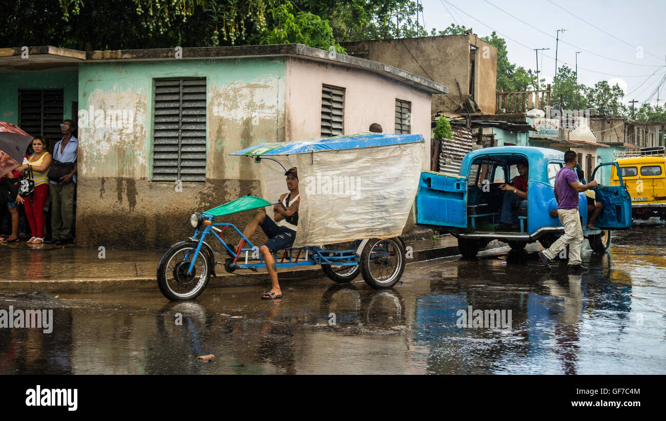 Cuban life in a rainy day Stock Photo - Alamy