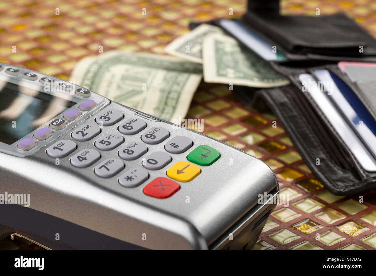 Payment wireless terminal and wallet with banknotes Stock Photo - Alamy