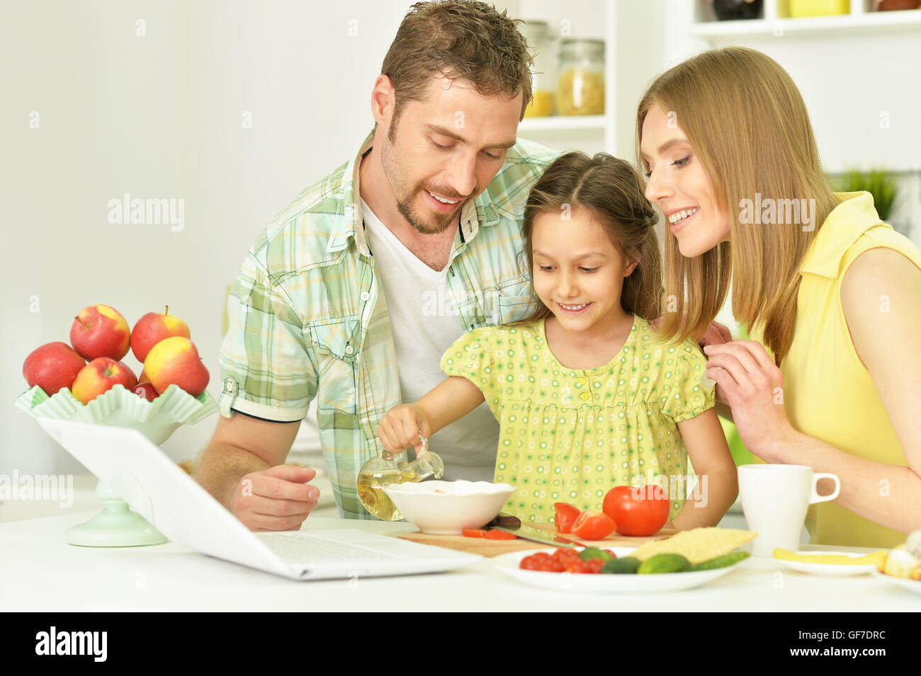 happy family cooking in kitchen Stock Photo - Alamy