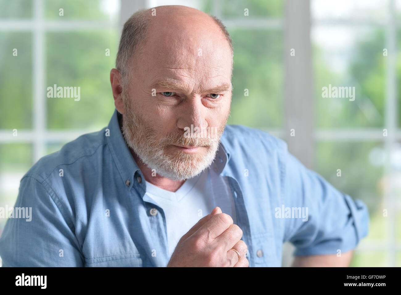 Senior man at home Stock Photo - Alamy