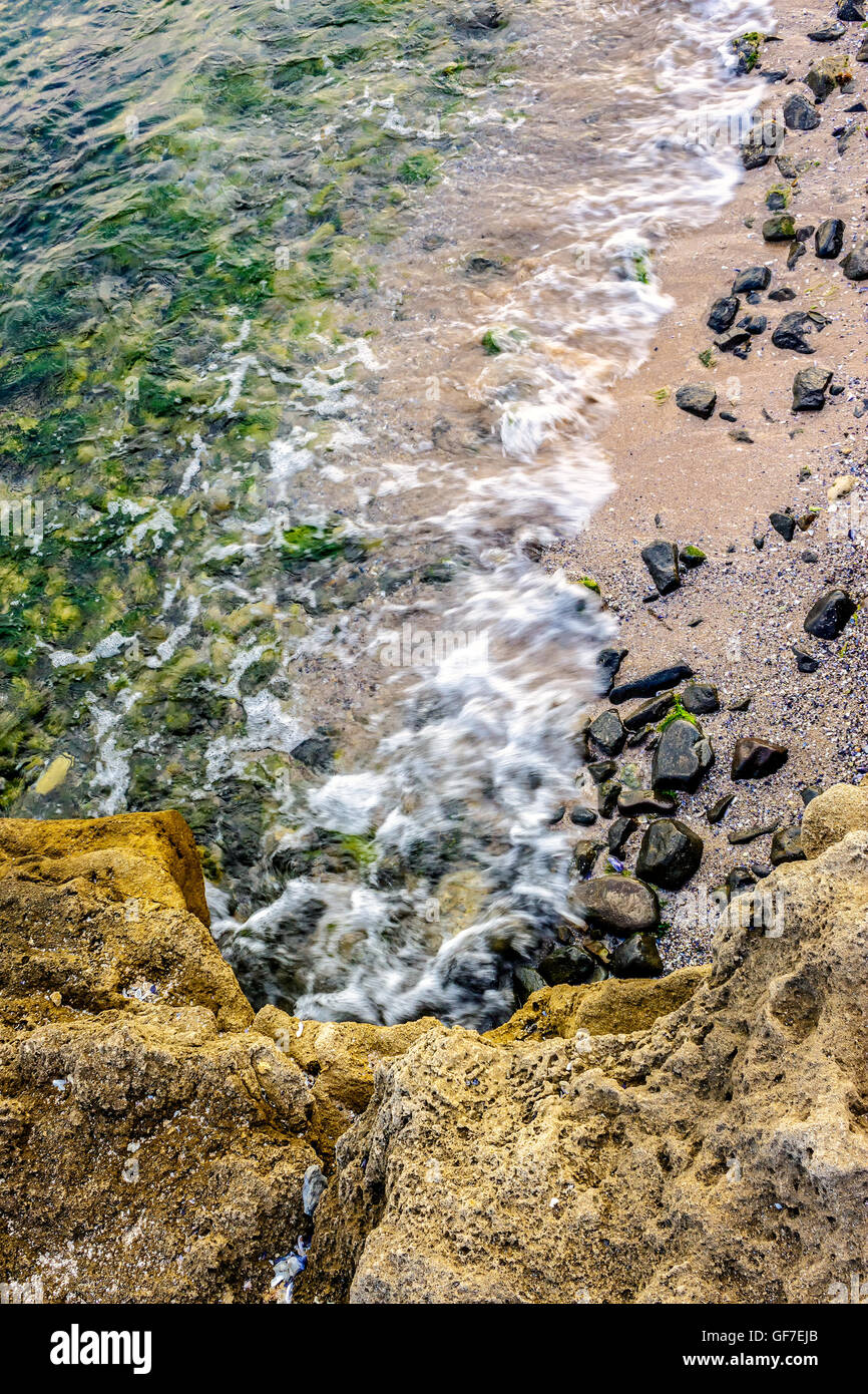 Wave rolls on the rocks hi-res stock photography and images - Alamy