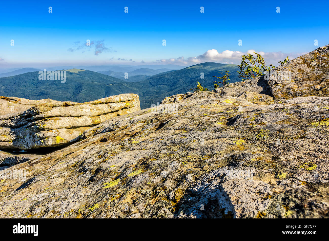 huge rocky ledge at the top of the mountain Stock Photo - Alamy