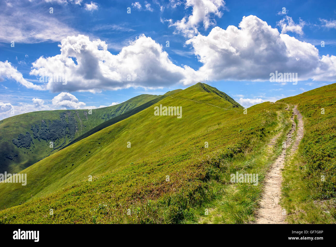 mountain landscape. travers path through hill side to the mountain top ...