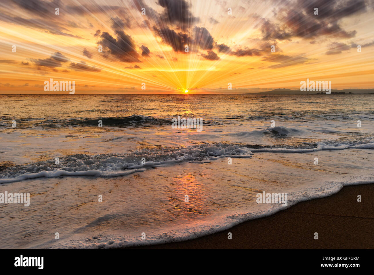 Ocean sunset sun rays is a brightly lit golden orange seascape with a ...