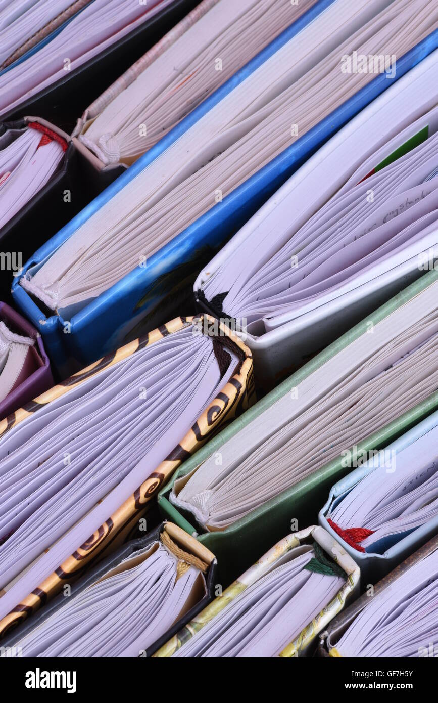 Stack of notebooks, work for teacher Stock Photo - Alamy