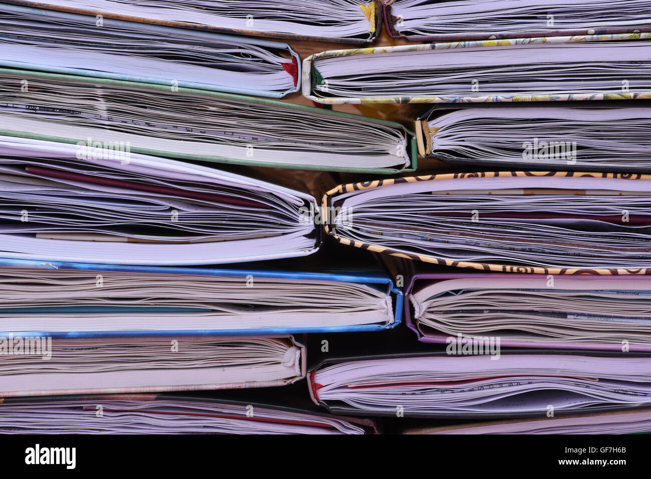 Stack of notebooks, work for teacher Stock Photo - Alamy