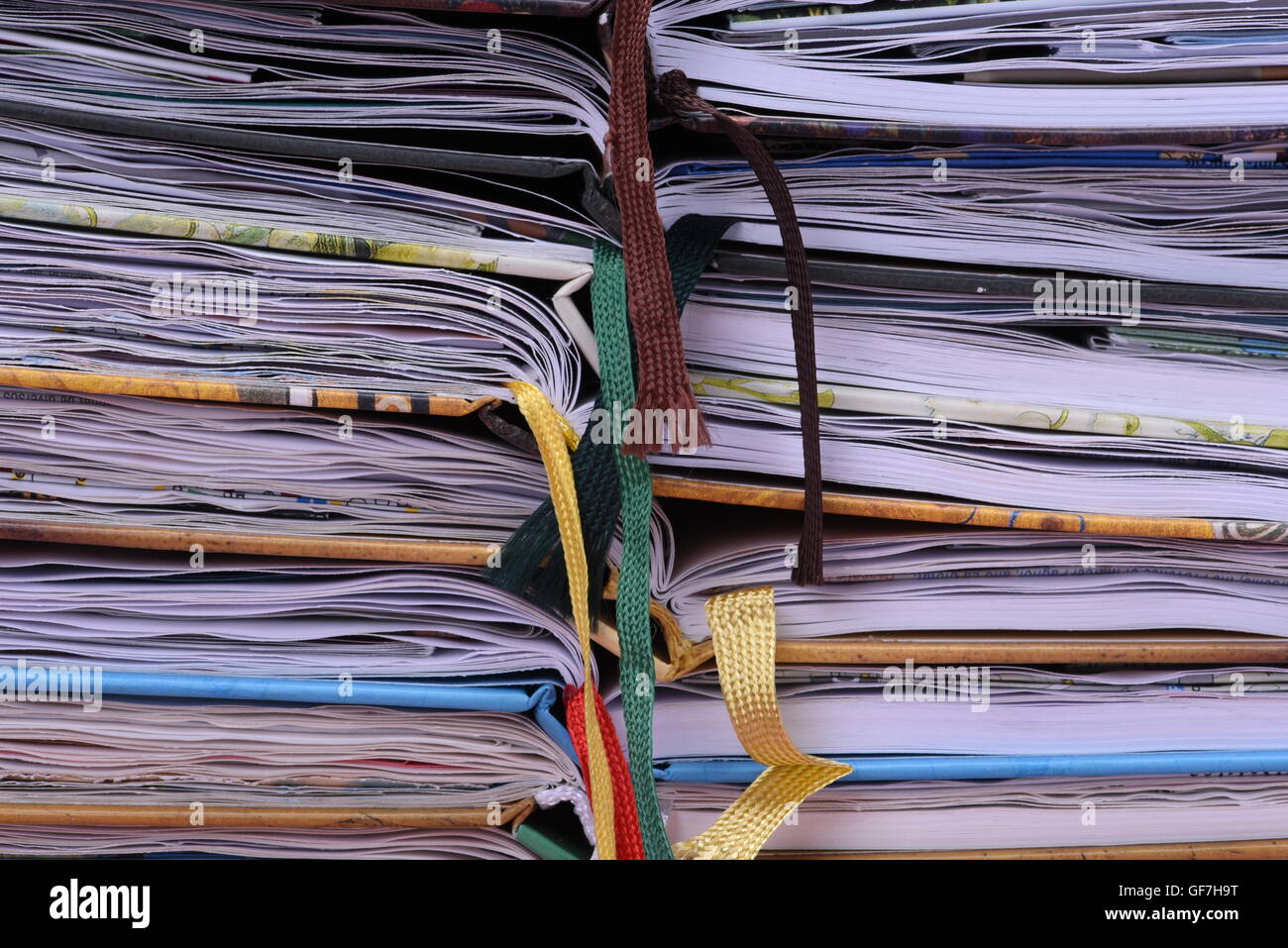 Stack of notebooks, work for teacher Stock Photo - Alamy