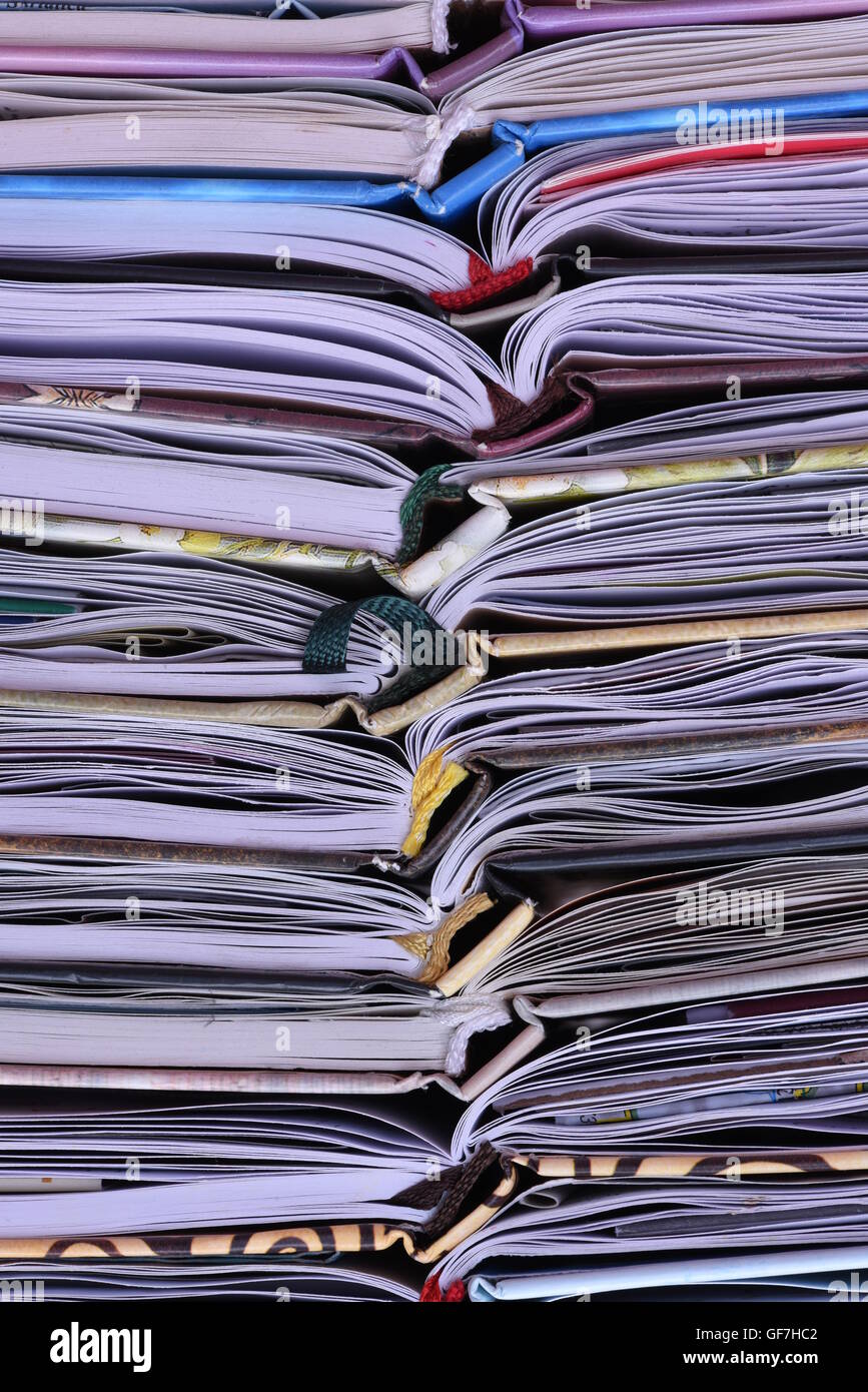 Stack of notebooks, work for teacher Stock Photo - Alamy
