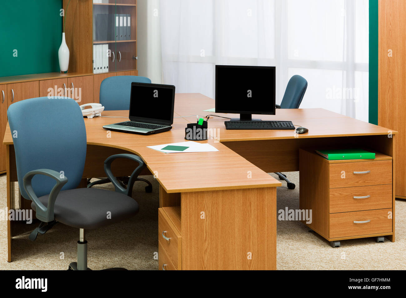 computer and laptop on a desk at modern office Stock Photo - Alamy
