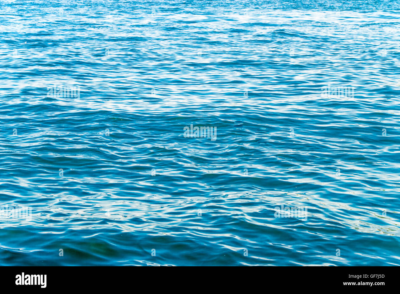 Calm Sea Surface With Waves Stock Photo - Alamy