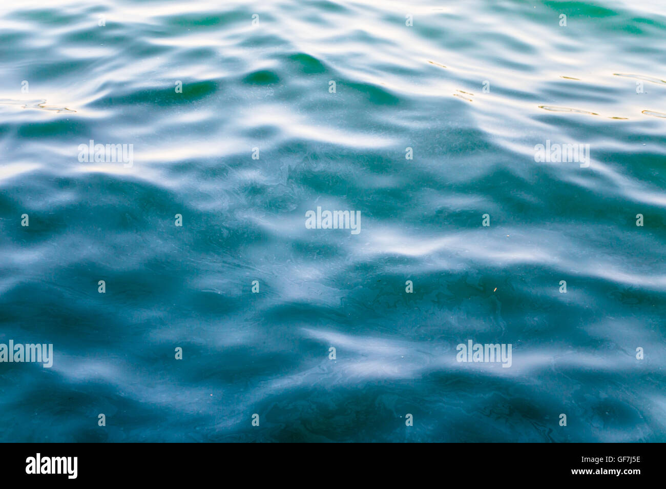 Calm Sea Surface With Waves Stock Photo - Alamy