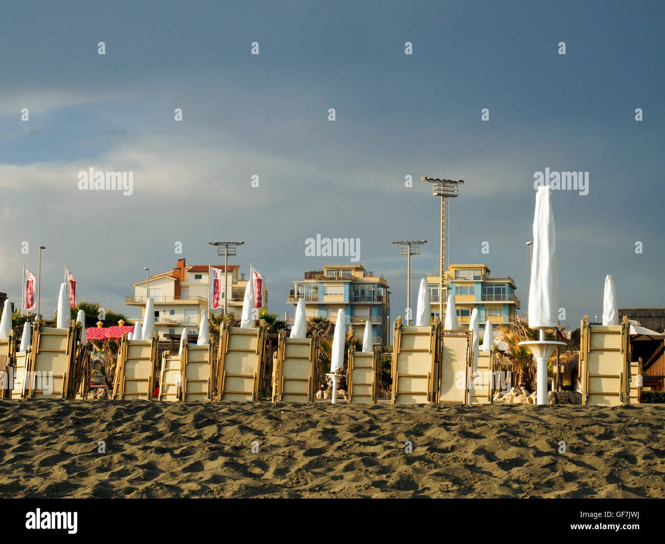 beach umbrella and deckchair - Ostia Lido - Rome, Italy Stock Photo - Alamy