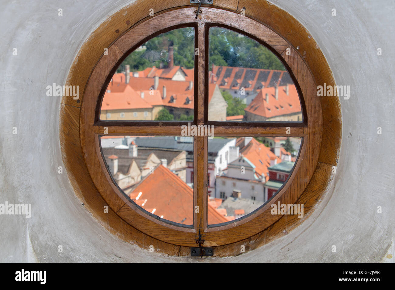 View of through the round window of the historic center of Cesky ...