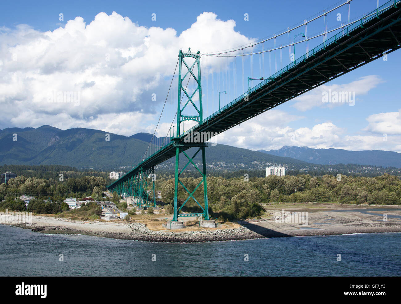 The suspension bridge that crosses Burrard Inlet and connects the city ...