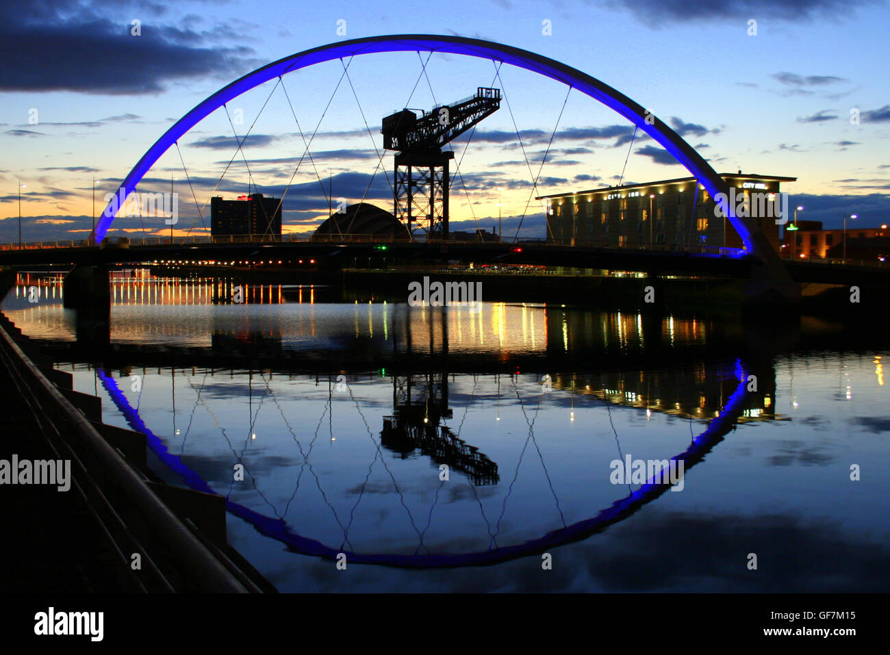 Glasgow`s "squinty bridge" at night. The Clyde arc, Glasgow Stock Photo ...