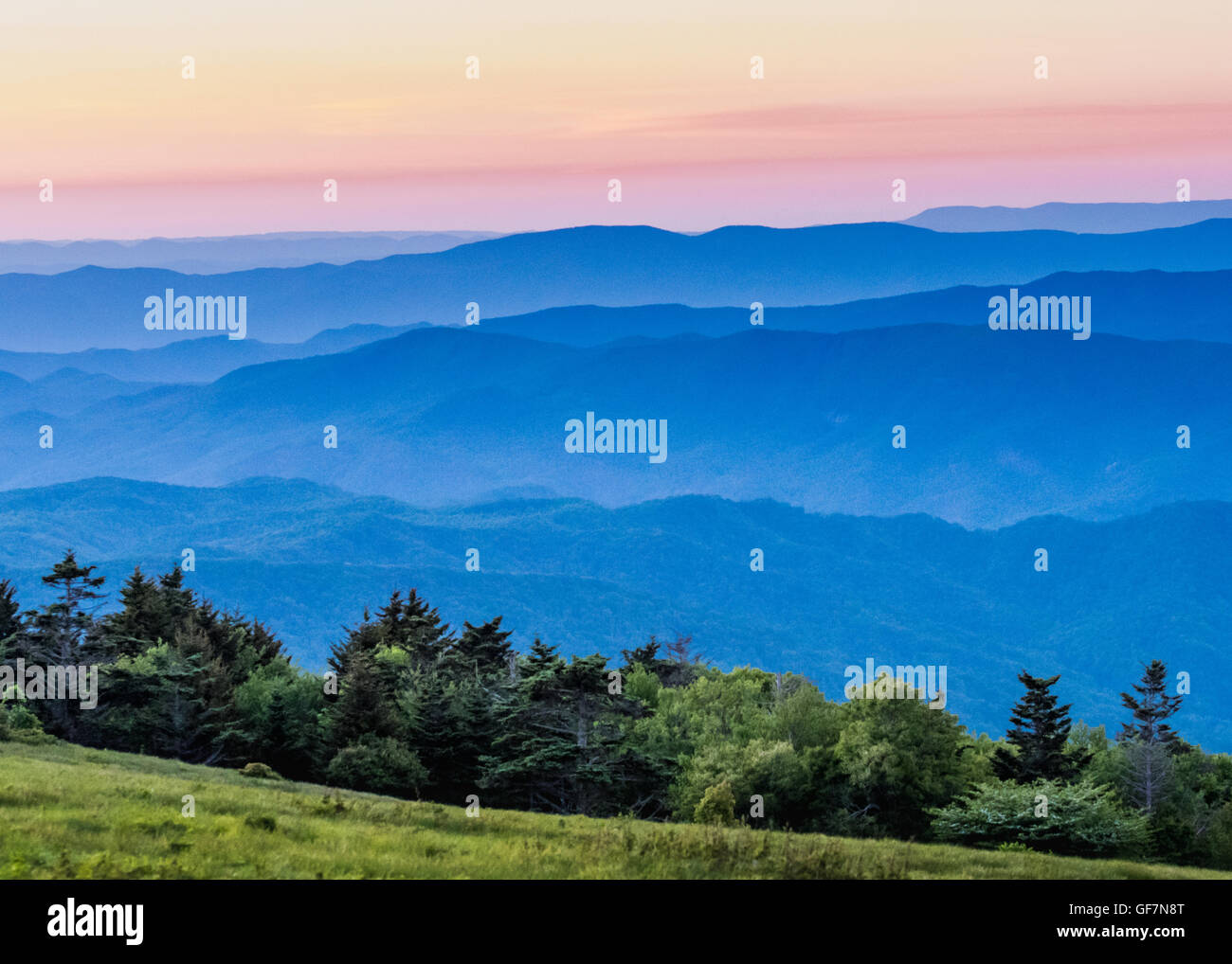 Hazy Blue Ridge Mountains at Sunset with grass bald in foreground Stock ...