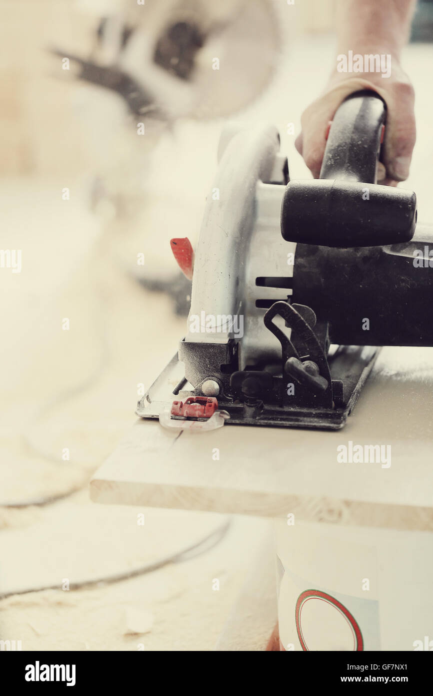 Man holding circular saw hi-res stock photography and images - Alamy