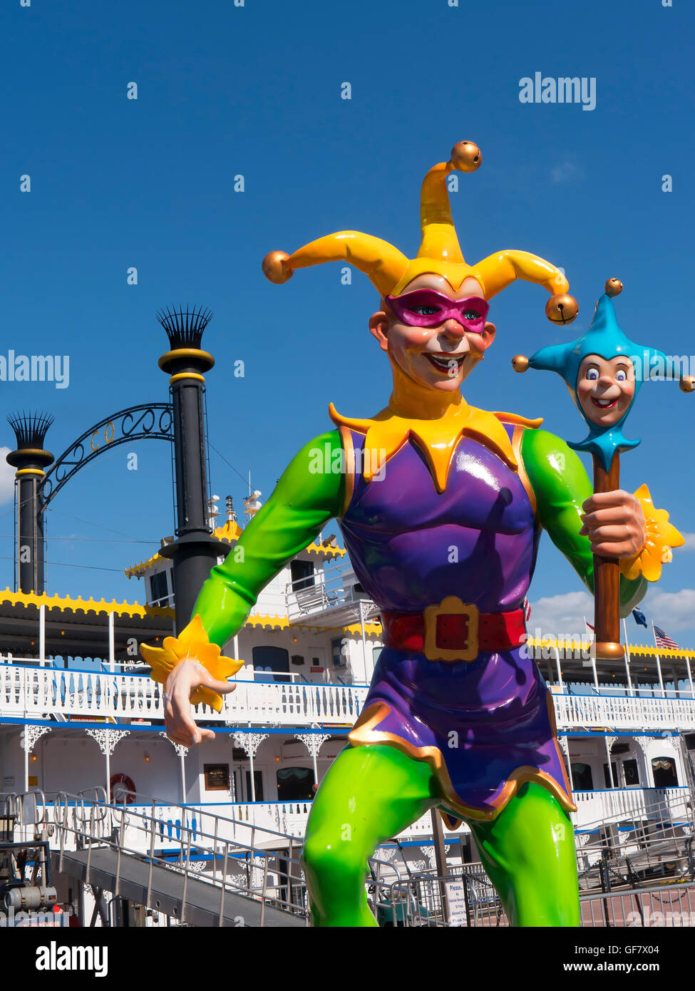 Colourful statue by the Paddle Wheeler Creole Queen in New Orleans ...