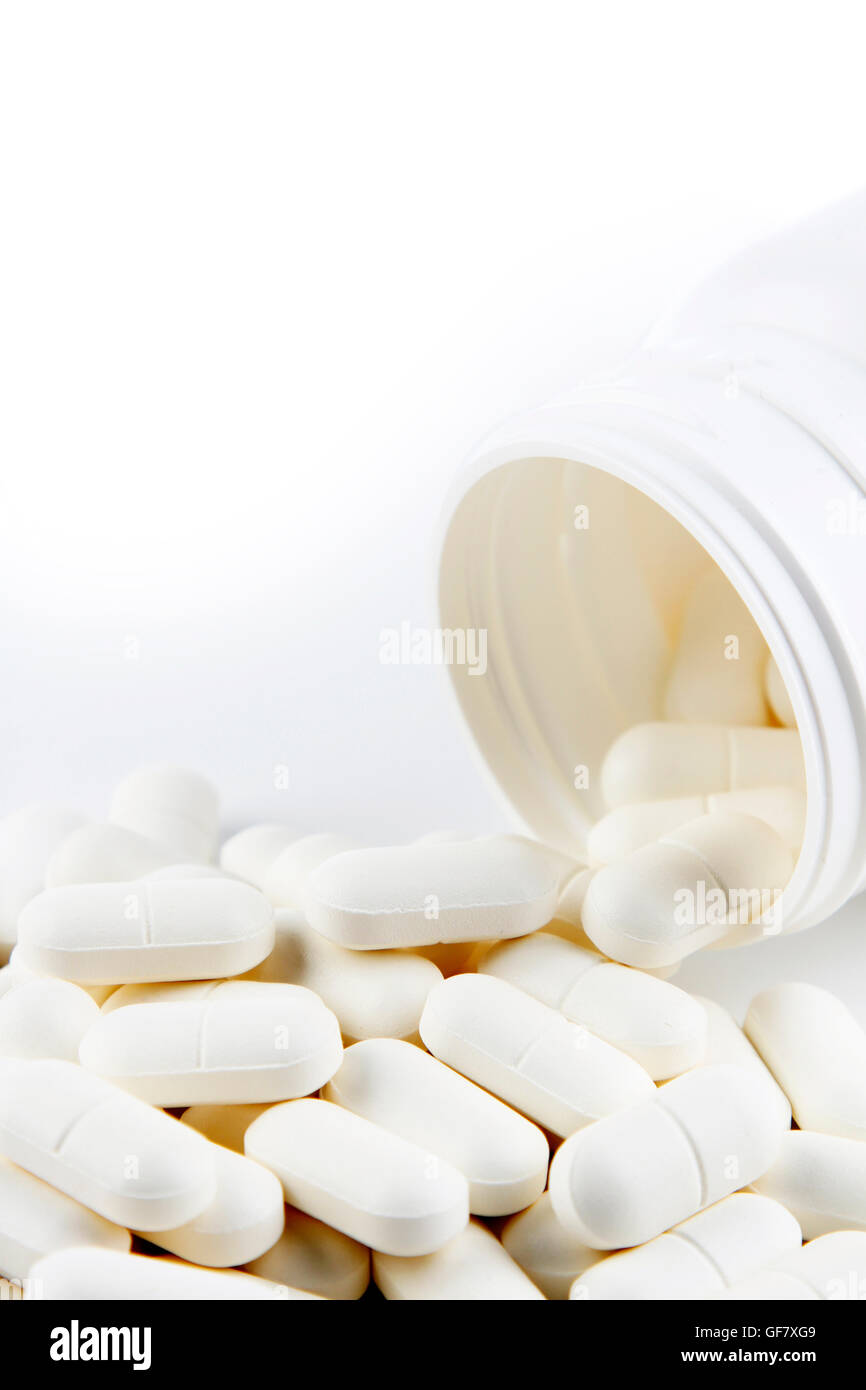 Closeup pill spilling from container hi-res stock photography and ...
