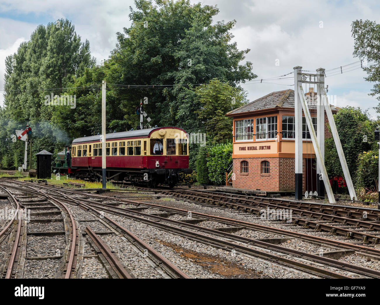 GWR restored carriage pulled by a restored steam locomotive at the ...