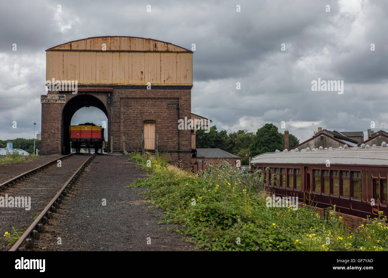 Coal truck in the tunnel full of coal to load a restored steam train ...