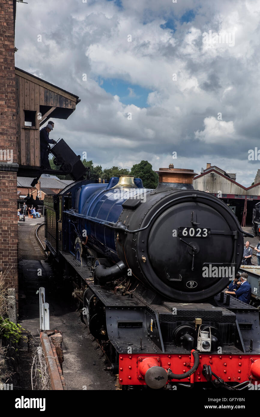 Coal being put into the restored steam locomotive King Edward II at ...