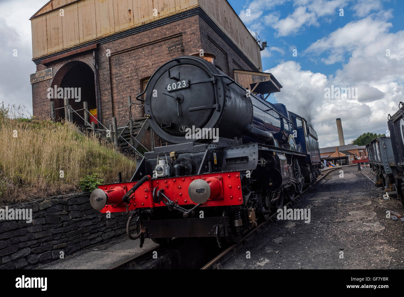Restored steam locomotive King Edward II being filled with coal at the ...