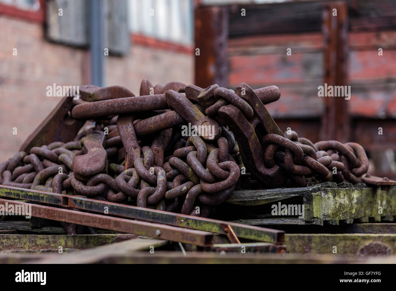 Rusty old iron chains in a train shed at the Didcot Railway Centre in ...