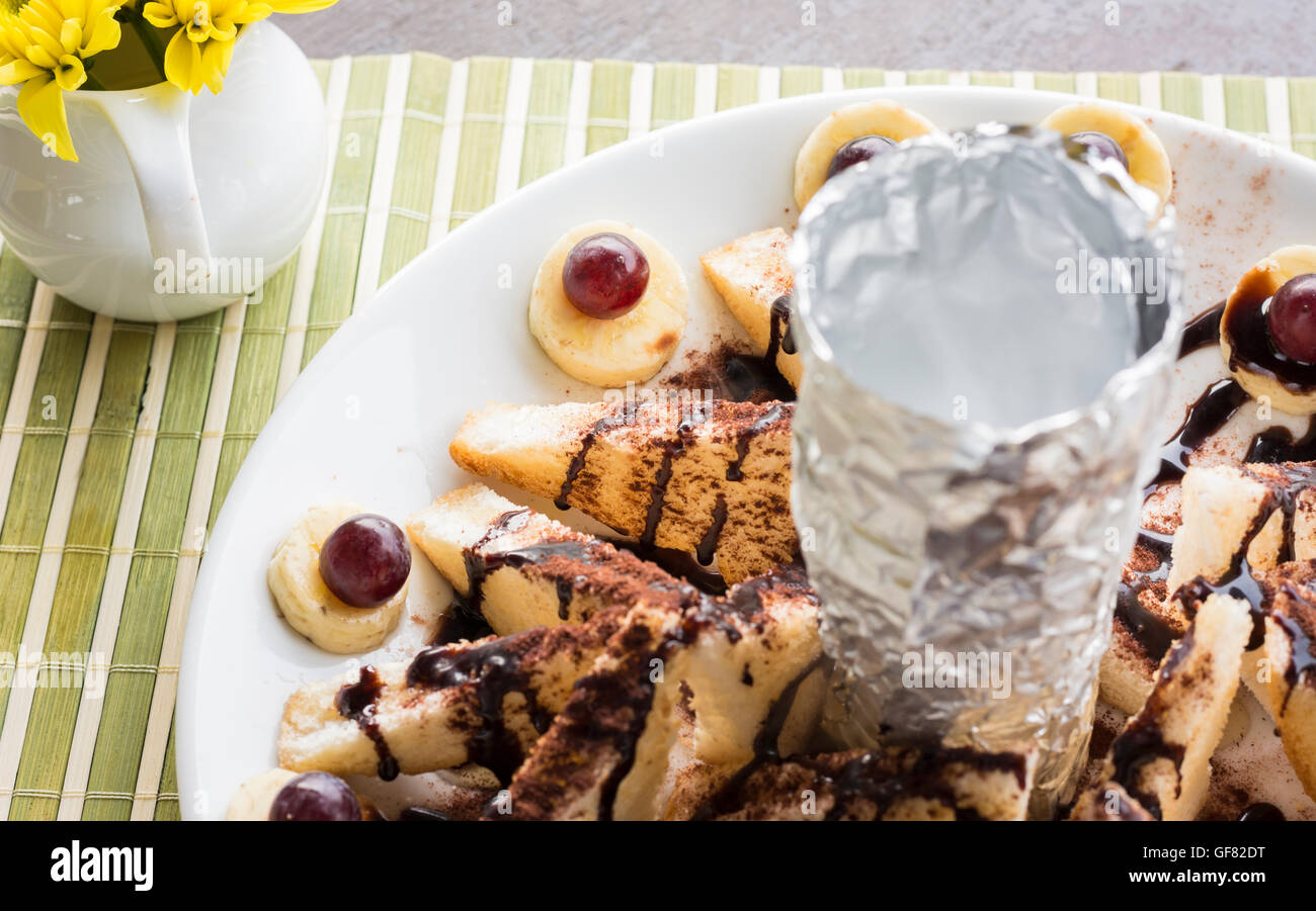 Honey toast and banana wtih dry ice on table background Stock Photo - Alamy