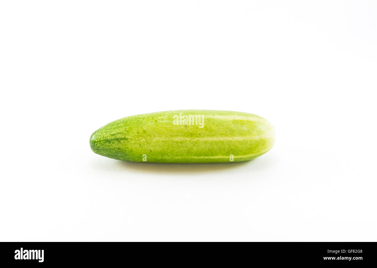 Green cucumber in on white background Stock Photo - Alamy